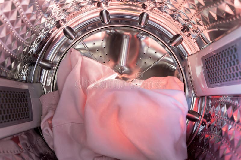 A View from Inside a Washing Machine Drum, Showing Colorful Clothes ...