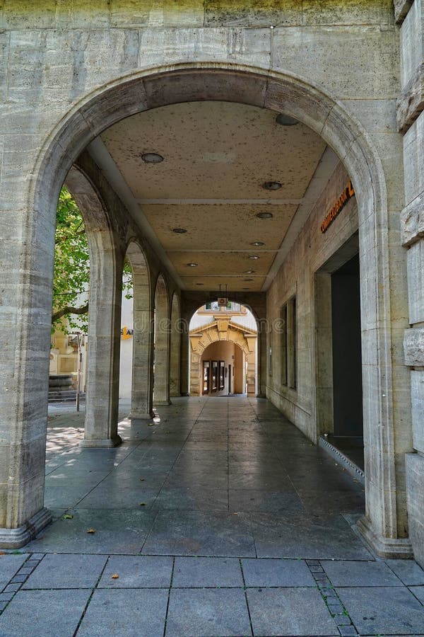The Interior Walkway of an Old - Fashioned Stone Building with Large ...