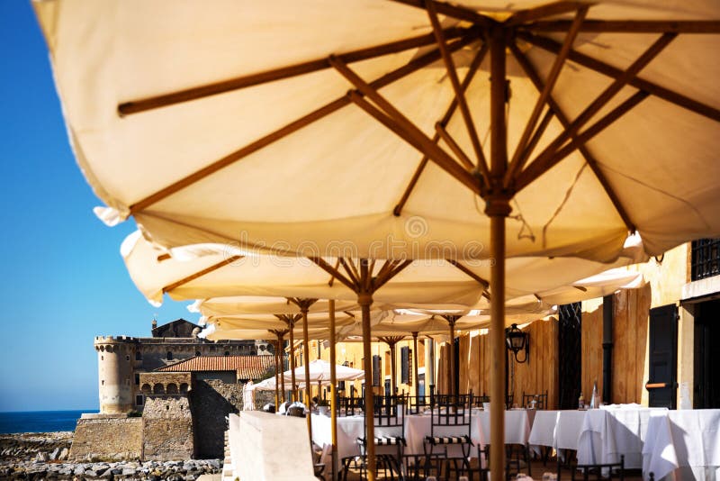 View of the Italian Castle through the Restaurant Stock Photo - Image ...