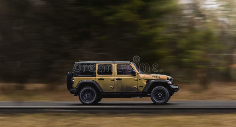 View of the Jeep Driving Fast on a Country Road. Editorial Photography ...