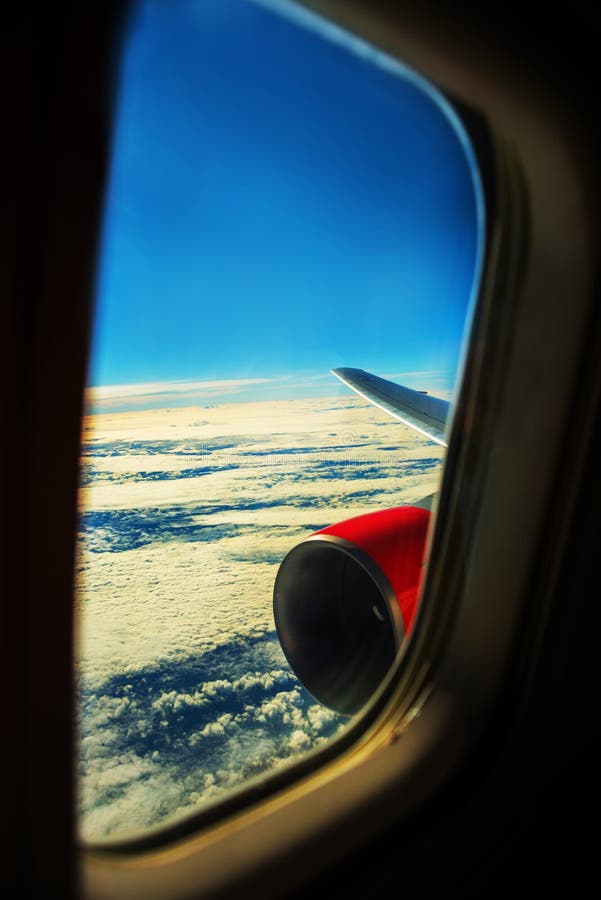 View from a Jet Plane Window High on the Blue Skies Stock Photo - Image ...