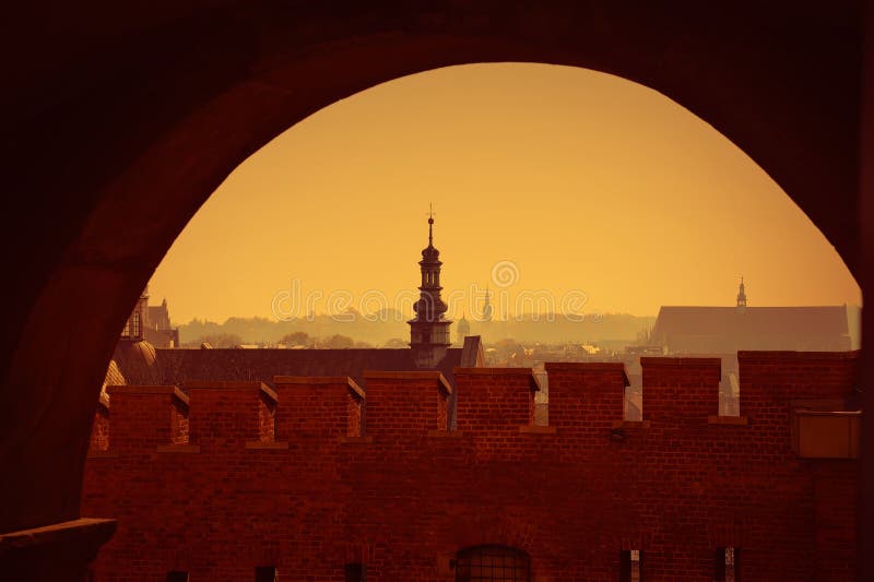 View of Krakow at Sunset with Silhouettes Stock Photo - Image of arch ...