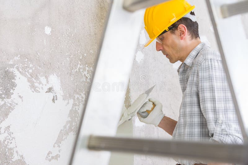 View through a Ladder of a Builder at Work Stock Photo - Image of ...