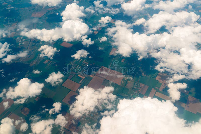 View Of Land, Fields, And Clouds From Above Stock Photo - Image of ...