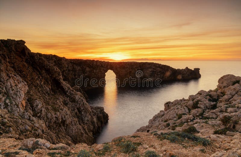 View of the Landmark Stone Arch of Pont D En Gil on Menorca Island at ...