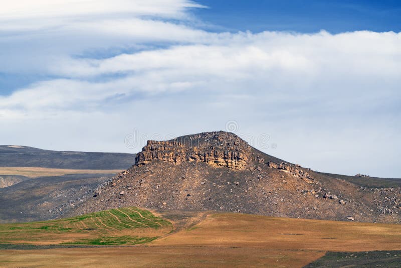 View of Large Stone Cliff and Farm Fields Stock Image - Image of field ...