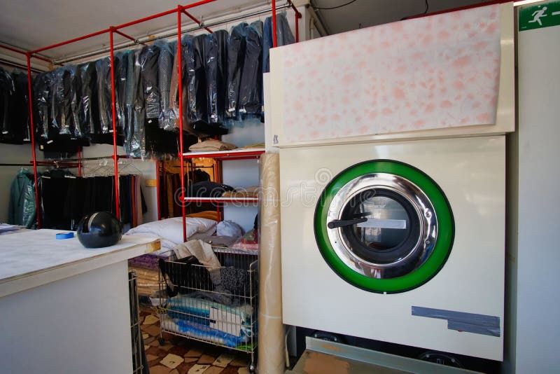 View of Laudry from Inside with Tools, Washing Machine and Iron Stock ...