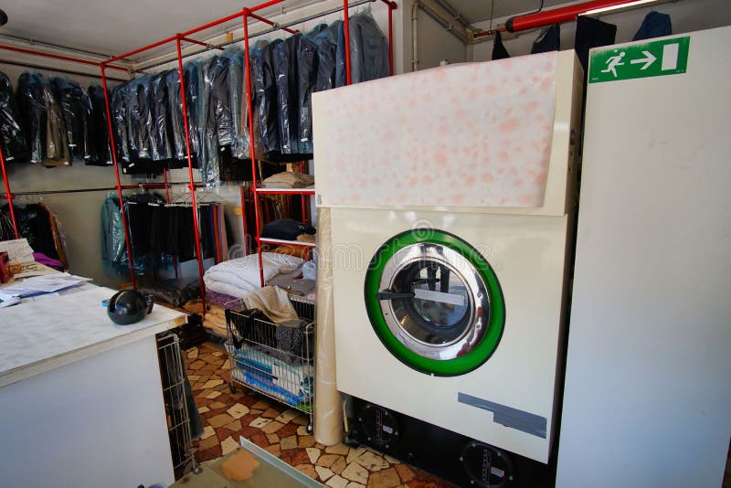 View of Laudry from Inside with Tools, Washing Machine and Iron Stock ...