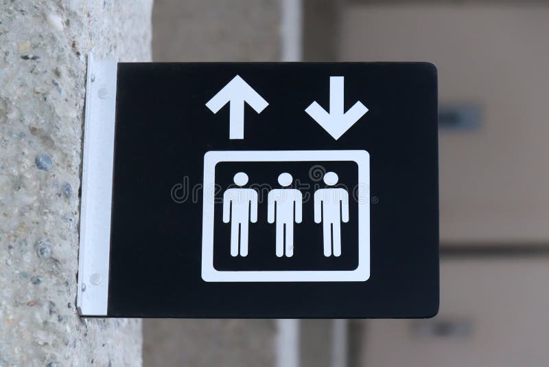 View of Lift Elevator Sign on Grey Wall Background Stock Image - Image ...