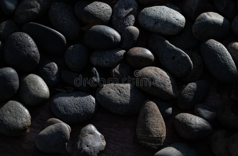 View of Light and Shadow on Black Pebbles with Natural Textured Surface ...