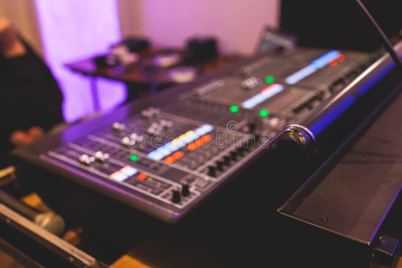 View of Lighting Engineer Operator Working on Mixing Console Workplace ...