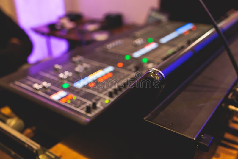 View of Lighting Engineer Operator Working on Mixing Console Workplace ...