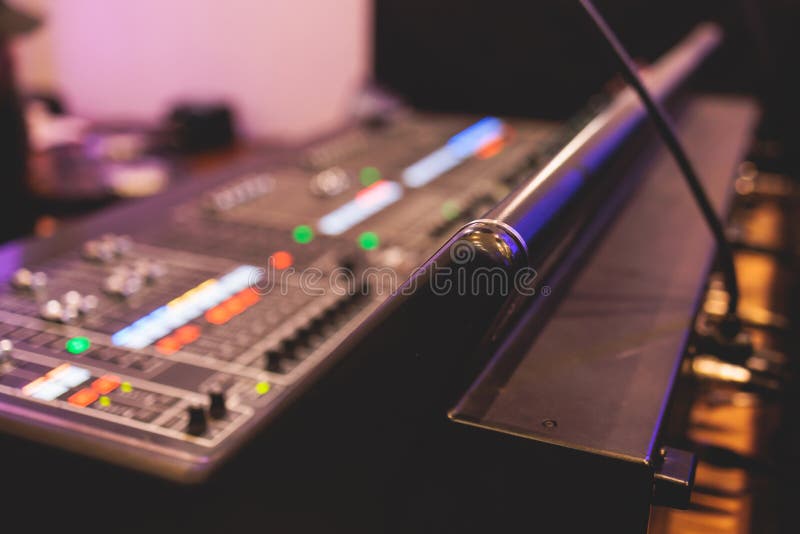 View of Lighting Engineer Operator Working on Mixing Console Workplace ...