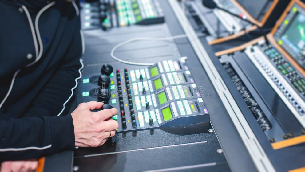 View of Lighting Technician Operator Working on Mixing Console ...