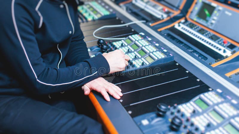 View of Lighting Technician Operator Working on Mixing Console ...