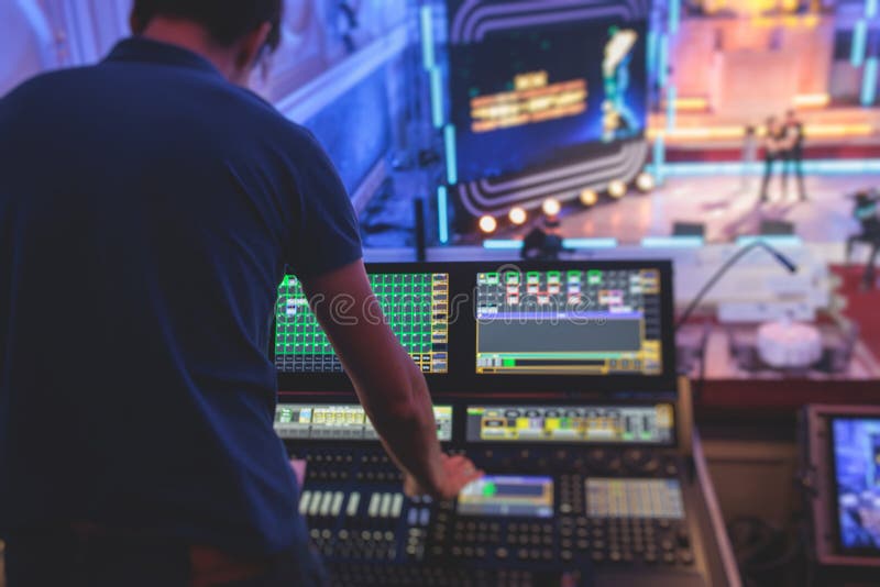 View of Lighting Technician Operator Working on Mixing Console ...