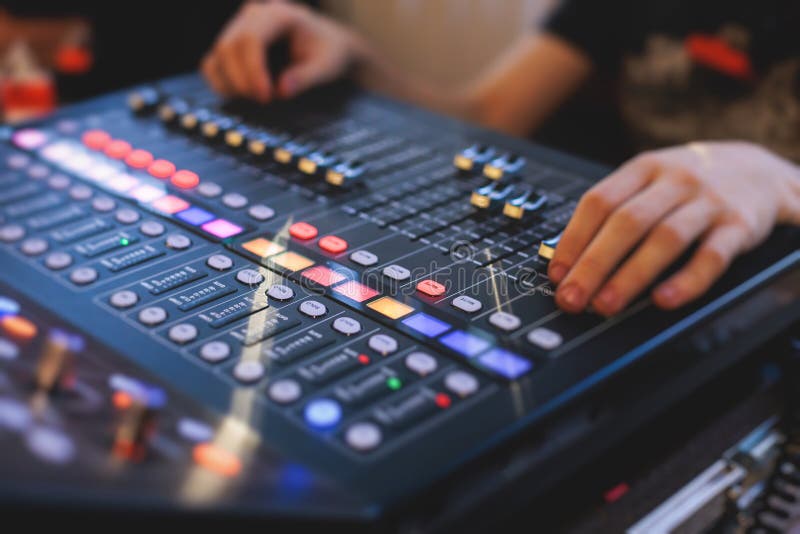View of Lighting Technician Operator Working on Mixing Console ...