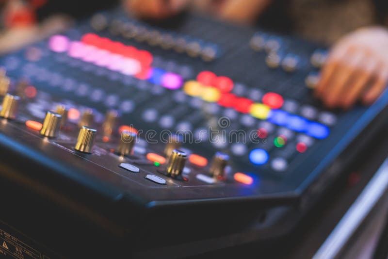 View of Lighting Technician Operator Working on Mixing Console ...