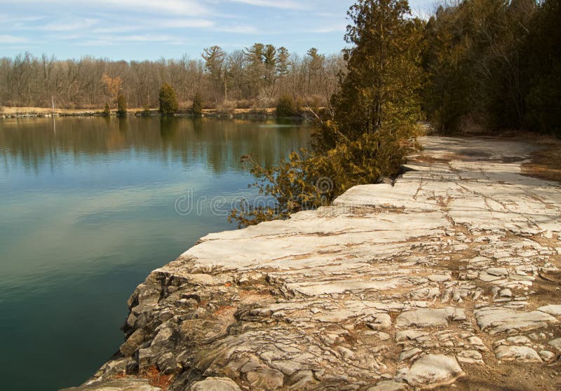 Magnificent Limestone Quarry Landscape with Reflections in Water Stock ...