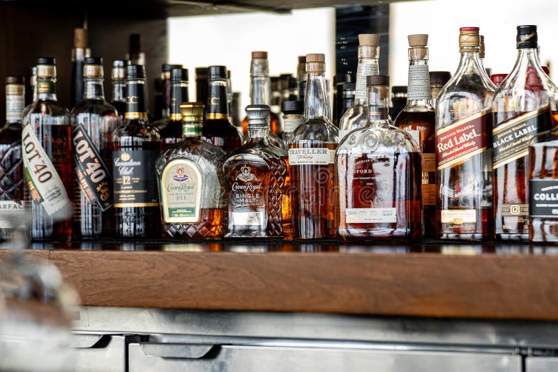 View of Liquor Bottles on a Bar Counter. Editorial Photo - Image of ...