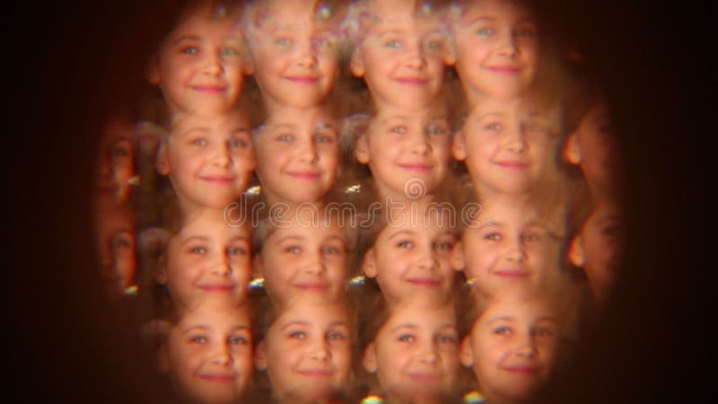 View of Little Girl Face through Rotating Tile Stock Video - Video of ...