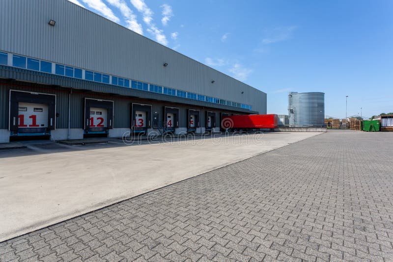View of Loading Docks at a Warehouse Editorial Image - Image of storage ...