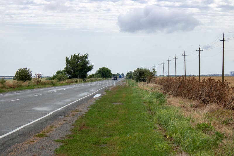 View on the Long Roadside Which Green Grass. Stock Image - Image of ...
