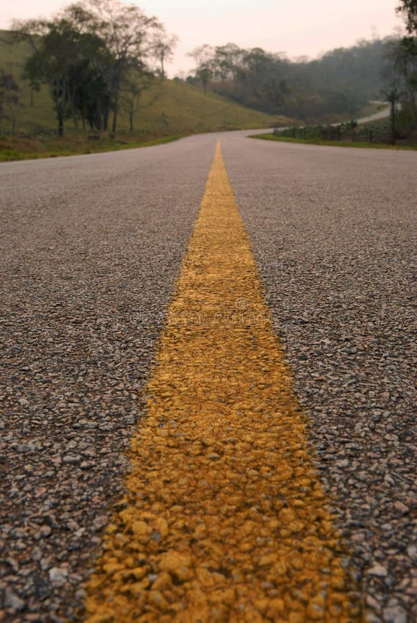 View of a Long Straight Road Cutting through a Barren Scenery of the ...