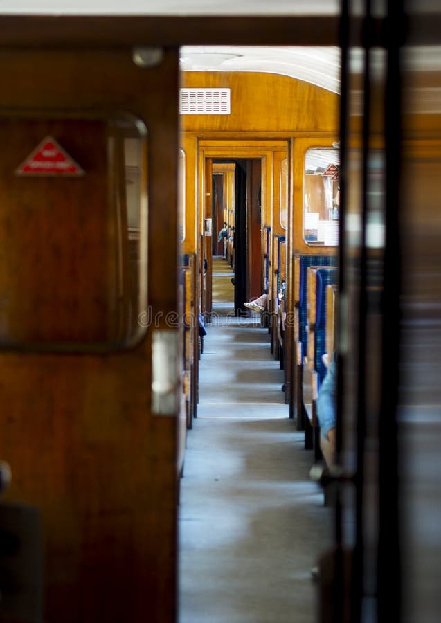 View Looking Down a Train Carriage with Wooden Seats Stock Photo ...