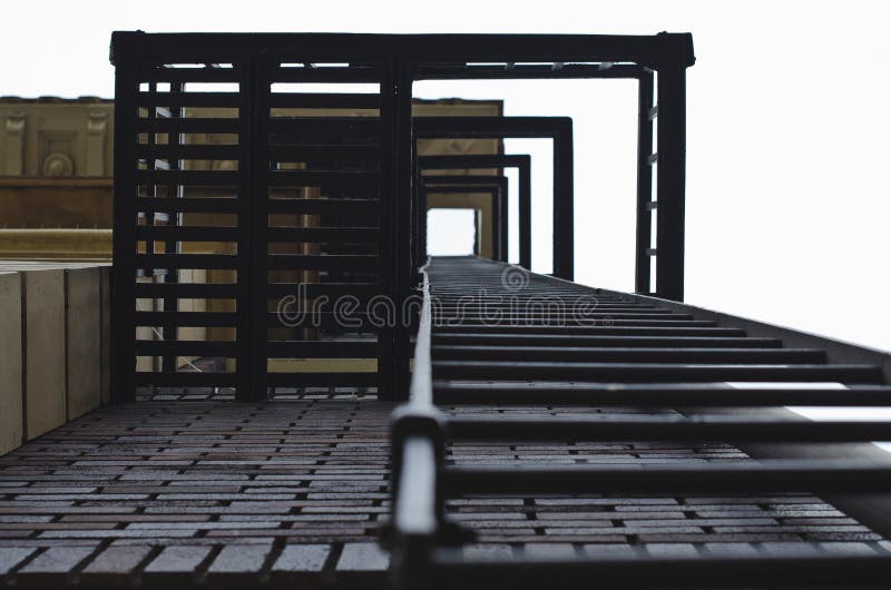 Looking Up the Square Ladder on the Wall Stock Photo - Image of detail ...