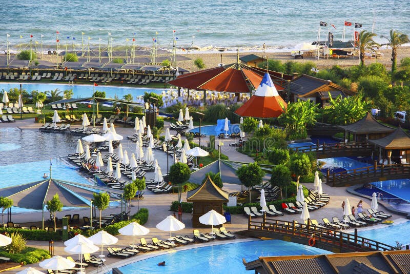 View of the Lounge Chairs Around Pools Stock Photo - Image of hotel ...