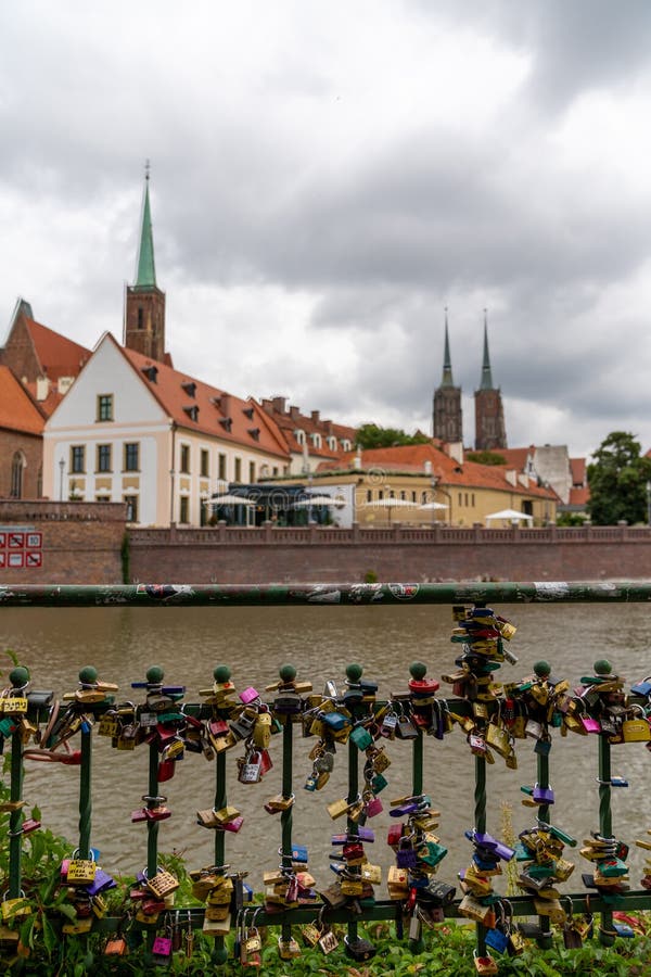 View of Love Locks on a Bridge Railing in Wroclaw with the Cathedral in ...