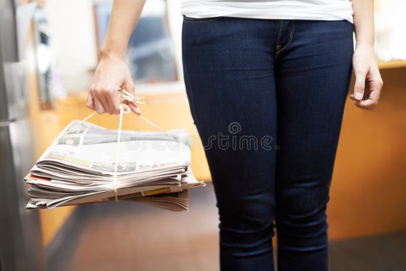 She always Recycles. View of the Lower Half of a Womans Body, while she ...