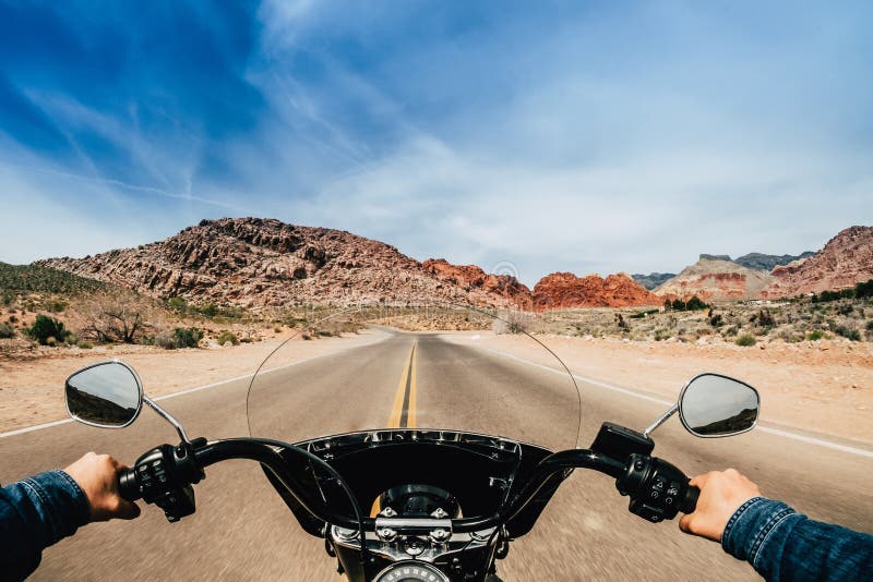 View of a Man Driving a Motorcycle on a Road Stock Photo - Image of ...