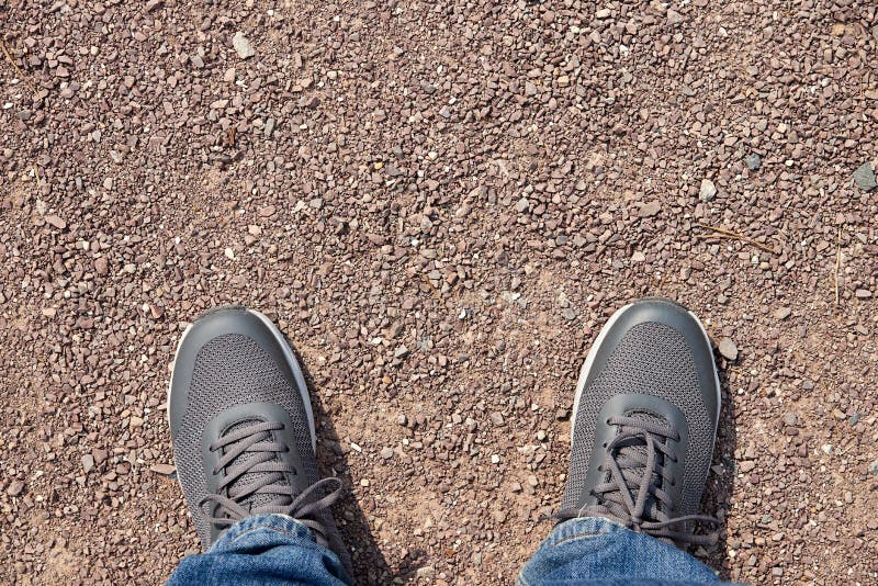 Top View of Feet Standing on Small Rubble Stock Photo - Image of ...
