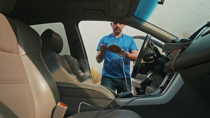View of Man Sitting Down on Driver Seat and is Ready To Start Driving ...