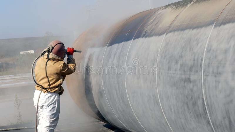 View of the Manuel Sandblasting To the Large Pipe. Abrasive Blasting ...