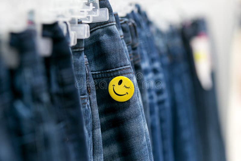 Many Denim Jeans Hanging on a Rack Stock Image - Image of denim, male ...