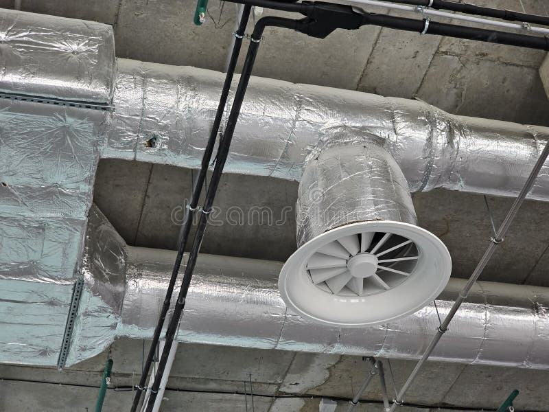 View of Metallic Ductwork Ventilation System in Modern Industrial Space ...