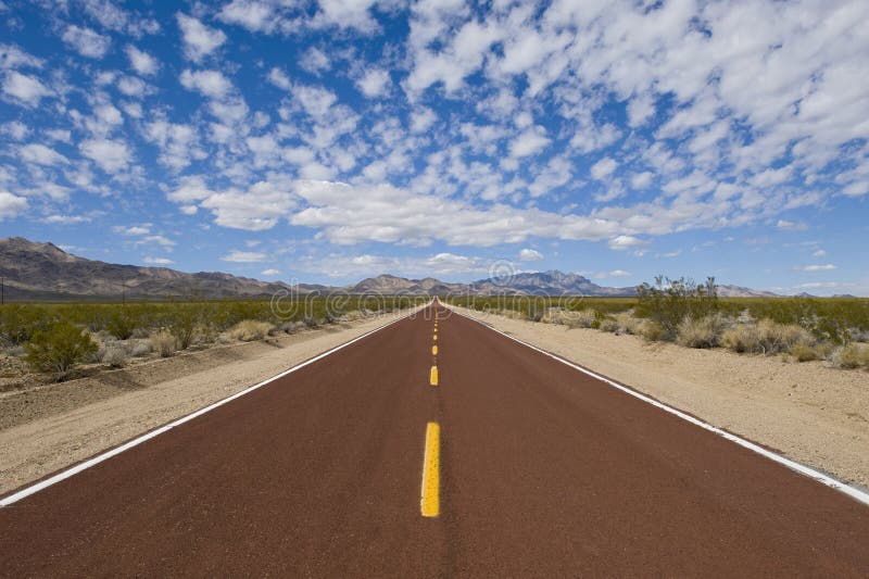 View from the Middle of a Straight Road Running through Deserted Land ...