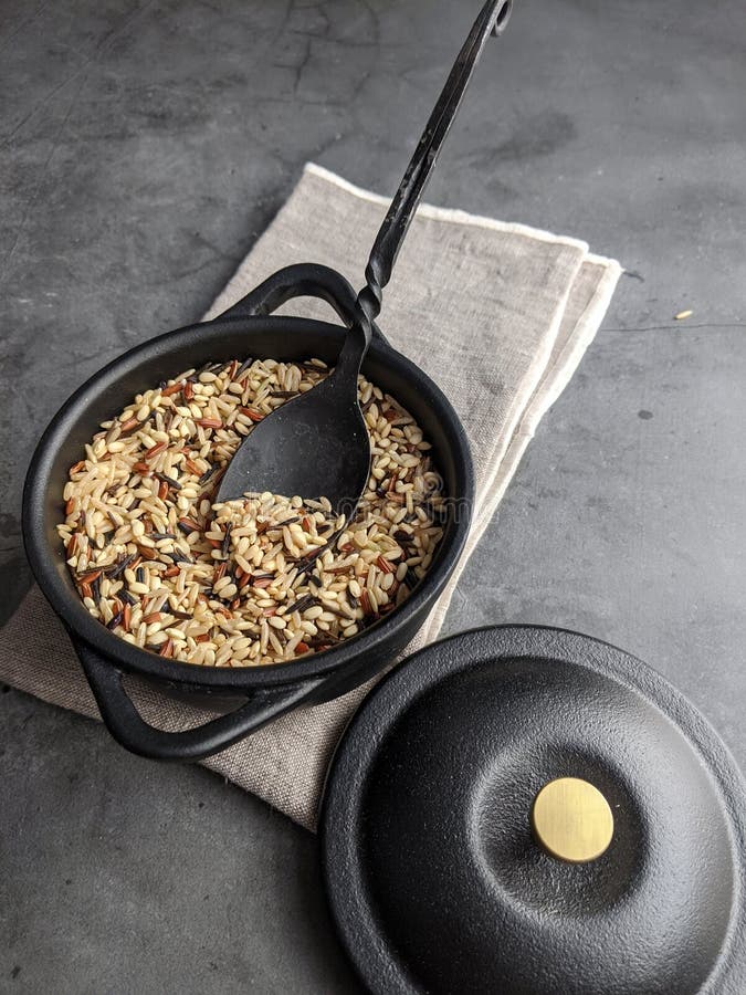 View of a Mini Pot of Cast Iron with Wild Rice Stock Photo - Image of ...