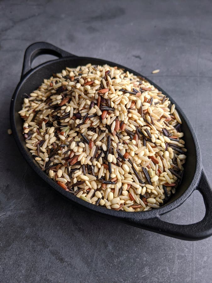 View of a Mini Pot of Cast Iron with Wild Rice Stock Photo - Image of ...