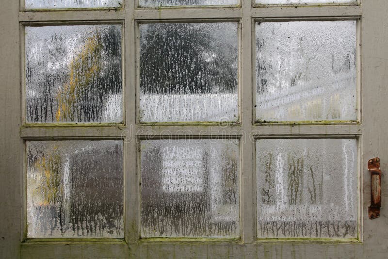View through a Misty Window Stock Image - Image of condensation ...