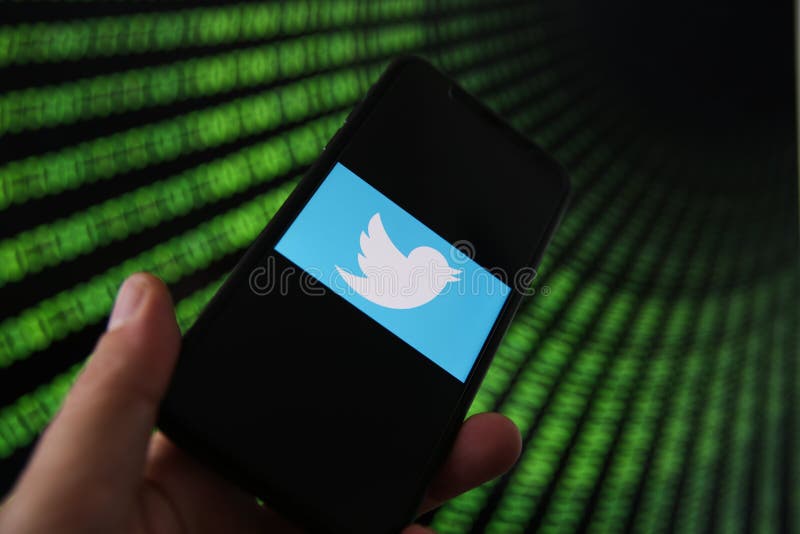 View on Mobile Phone with Twitter Logo Hold by Hand. Screen with Tunnel ...