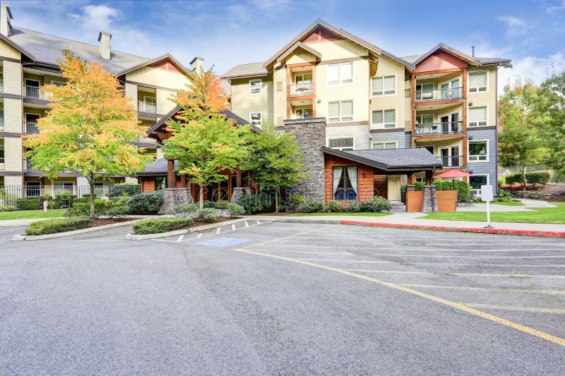 View of Modern Apartment Building with Parking Area Stock Photo - Image ...