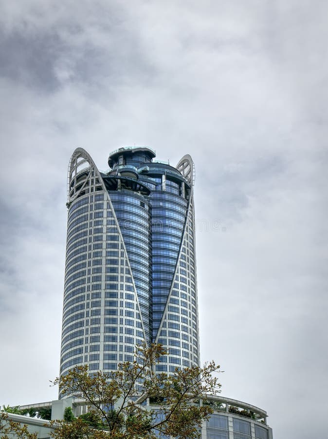 View of Modern Building Against Cloudy Sky Stock Image - Image of ...