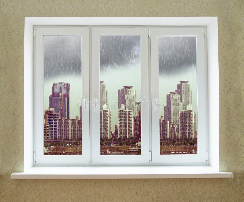 View through a Modern PVC Window Onto Rainy City Landscape Stock Photo ...
