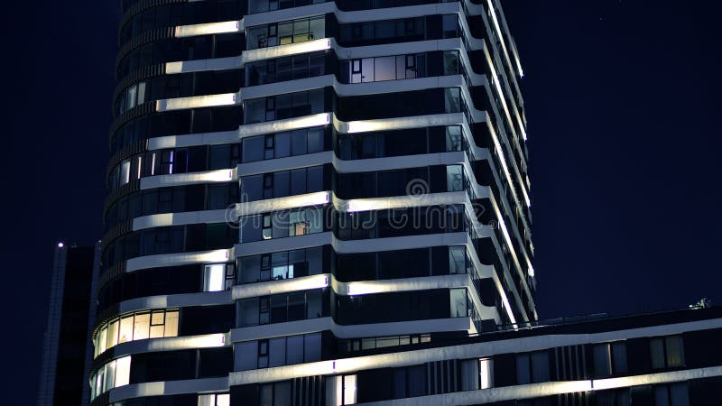 Glowing Windows of the Multi-storey Building in Night. Stock ...