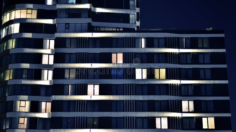 Glowing Windows of the Multi-storey Building in Night. Stock ...