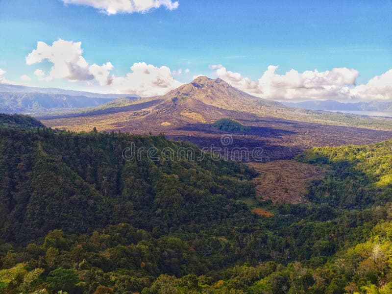 View of Mount Batur, Bali from a Distance Stock Image - Image of tree ...